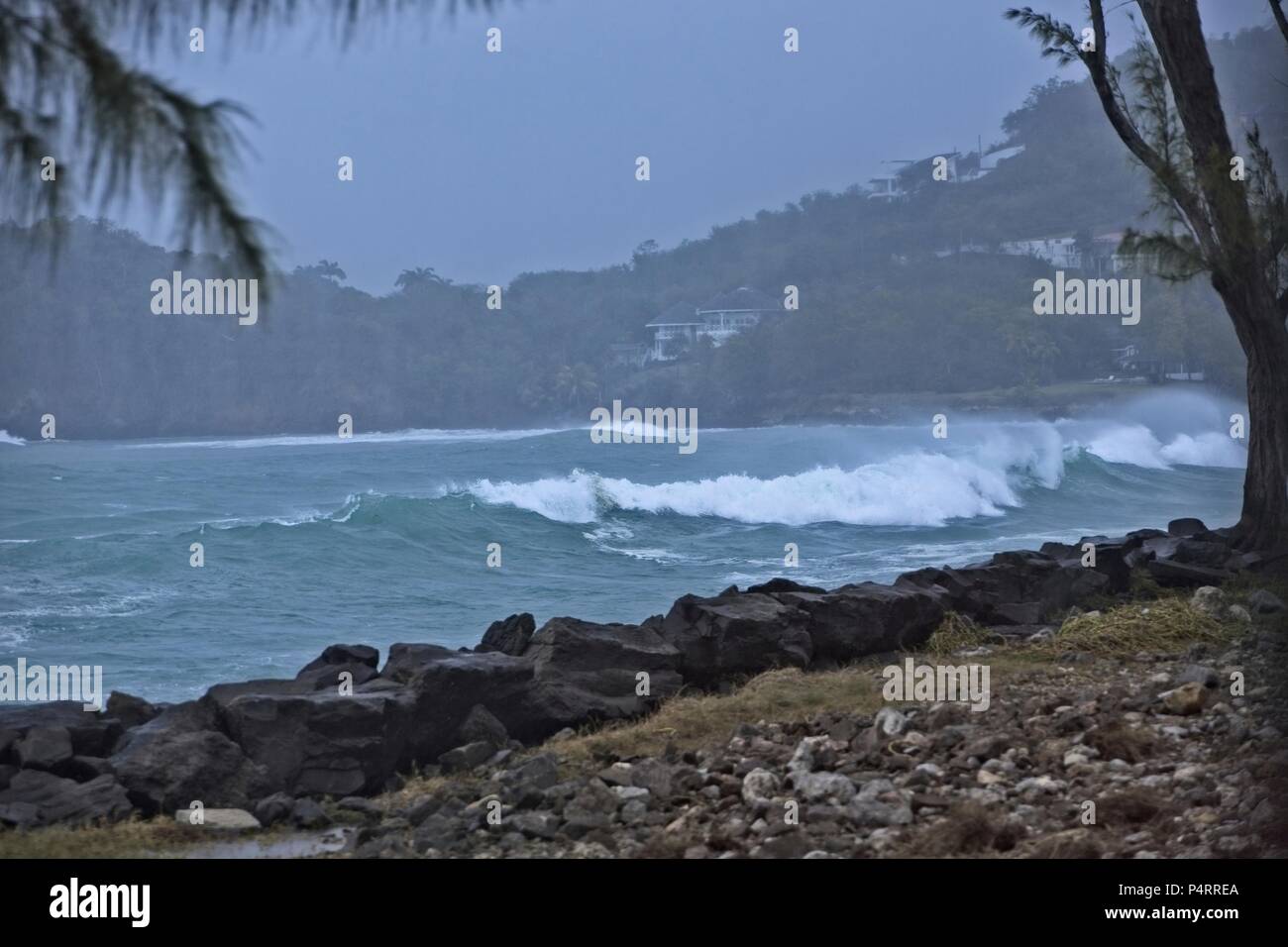 Heavy Surf hitting the rocks in St Lucia Stock Photo - Alamy