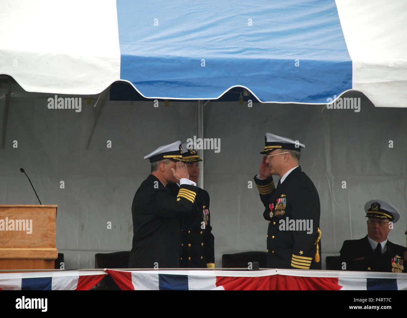 Capt. Robert E. Clark II, right, turns over command Stock Photo - Alamy