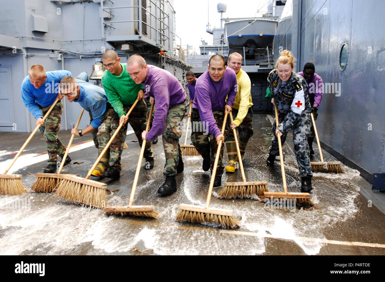 Royal Australian Navy Dental Assistant Seaman Christie Woodleigh, right ...
