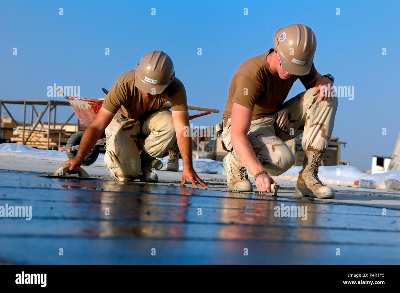 U.S. Navy Seabees from Naval Mobile Construction Battalion 40 smooth ...