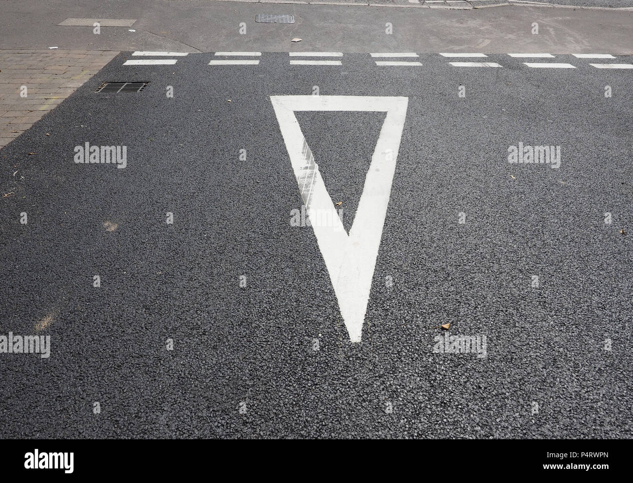 Regulatory signs, give way traffic sign on the road Stock Photo - Alamy