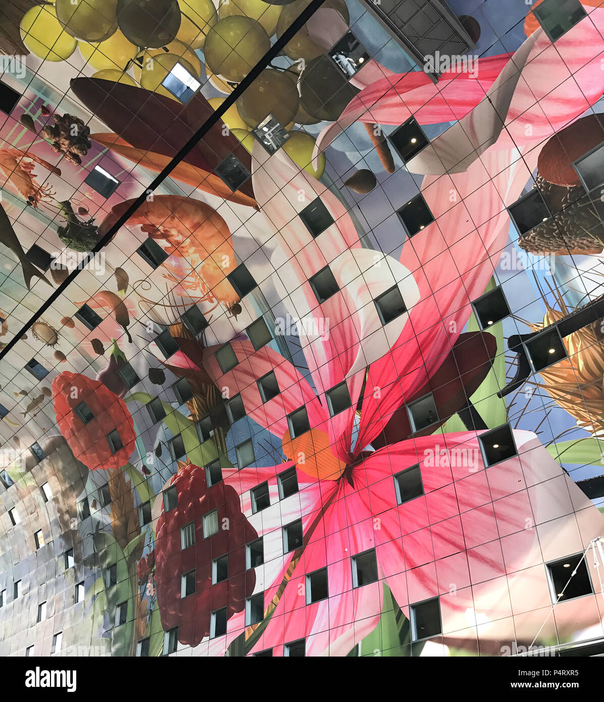 The colourful painted arch ceiling of the Markthal, famous market hall ...