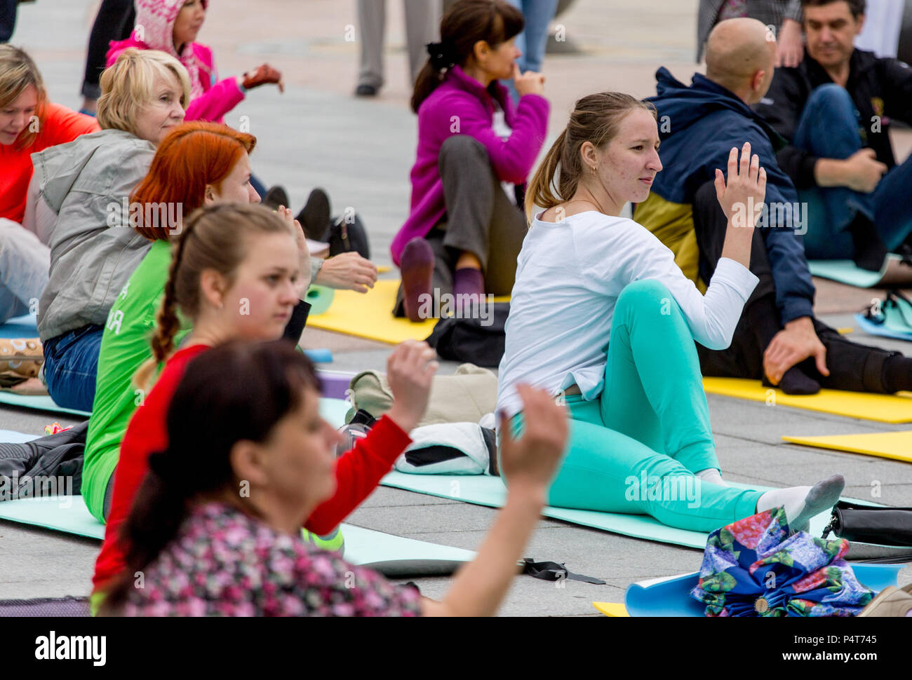 Russia, Vladivostok, 06/18/2016. Spectators do yoga's asana (posture ...