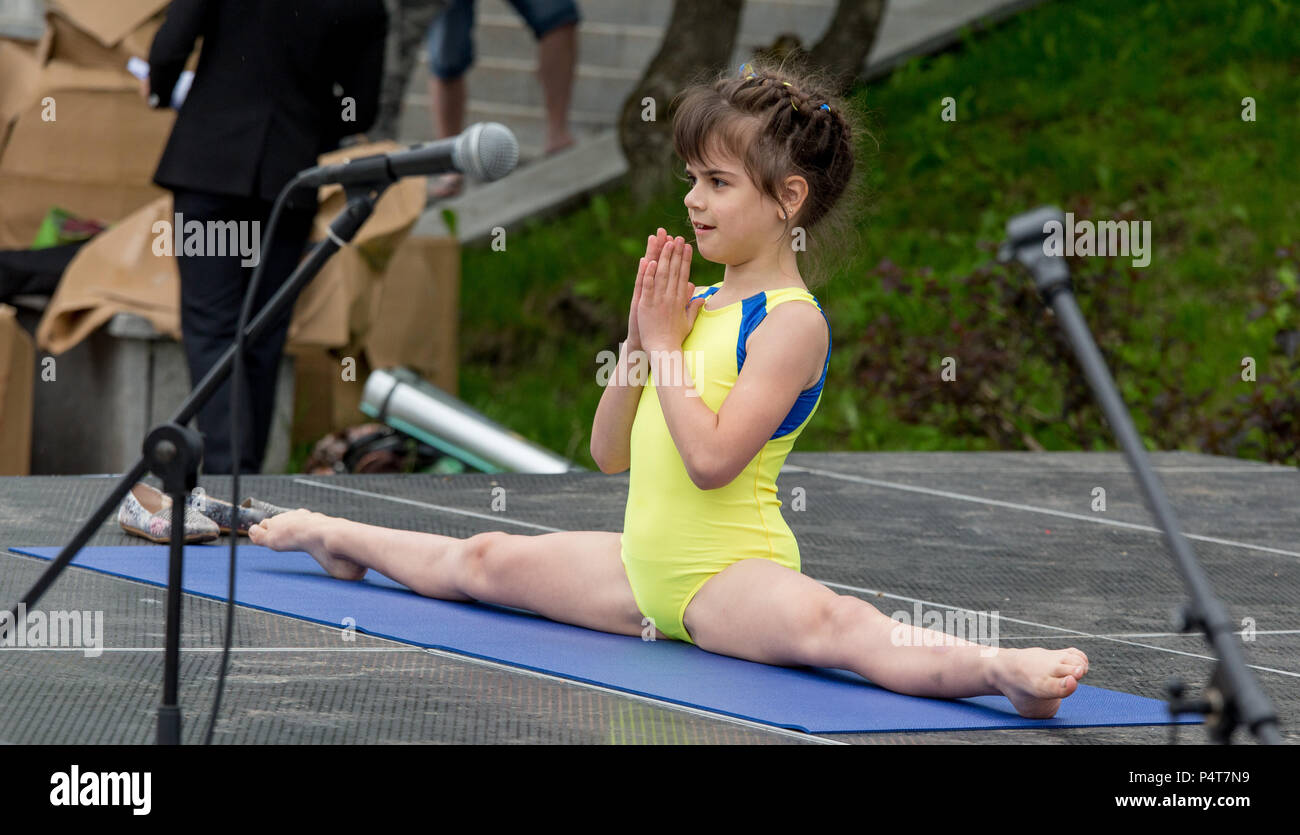 Russia, Vladivostok, 06/18/2016. Young caucasian girl presents yoga's ...