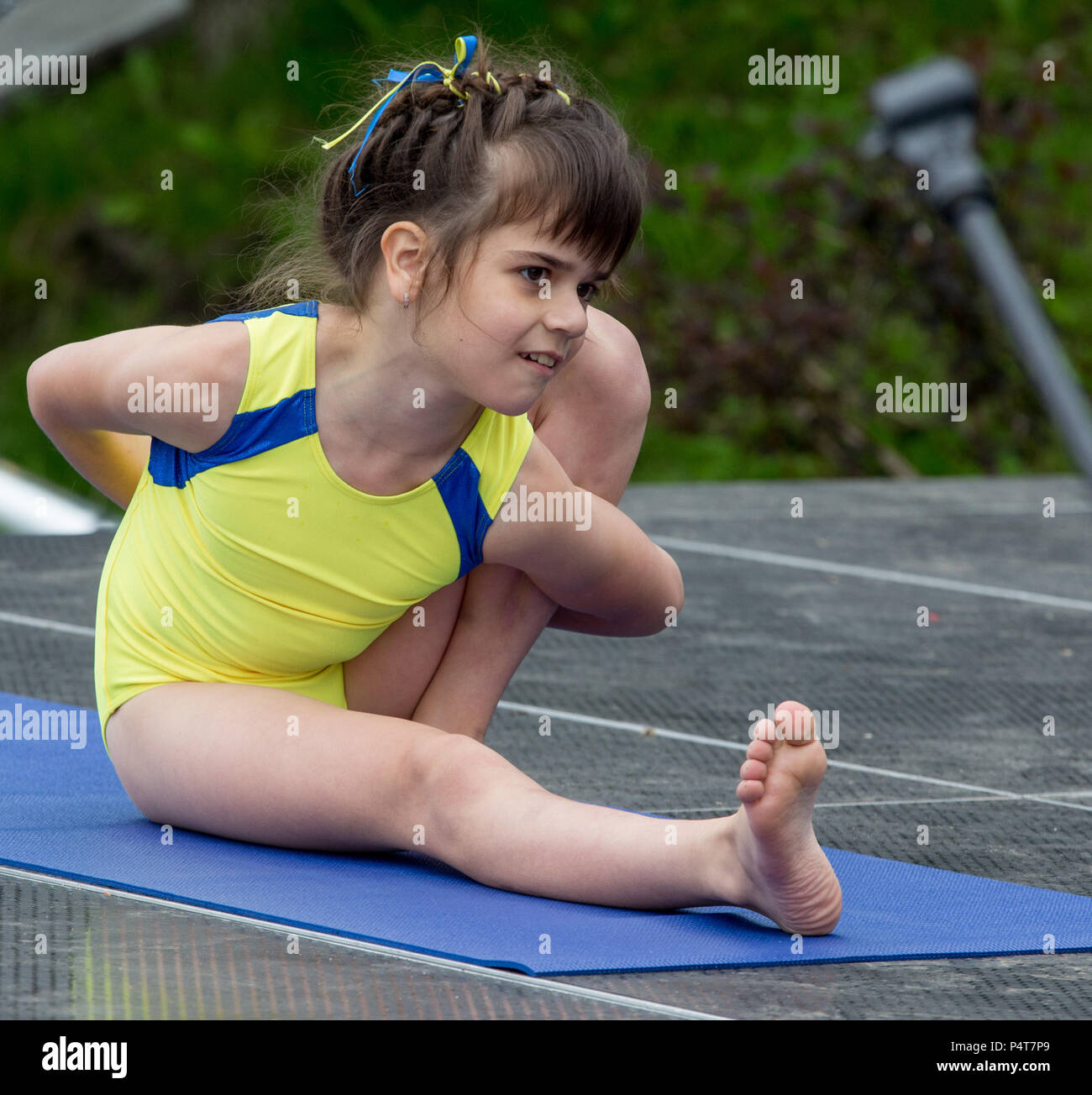 Russia, Vladivostok, 06/18/2016. Young caucasian girl presents yoga's ...