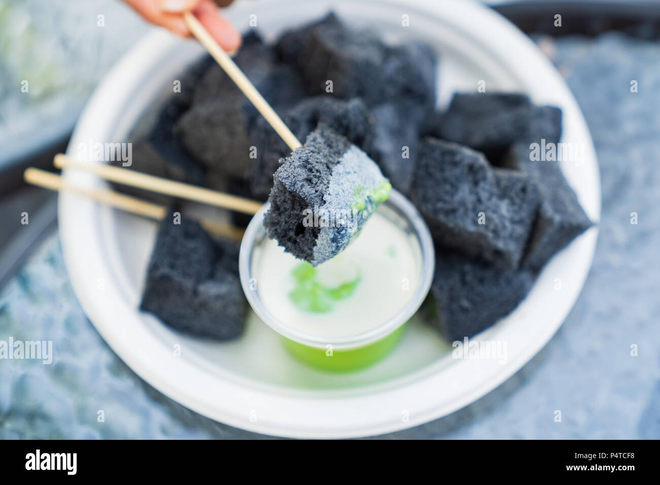 Sangkhaya dessert thai style, wiht black activated charcoal bread and ...