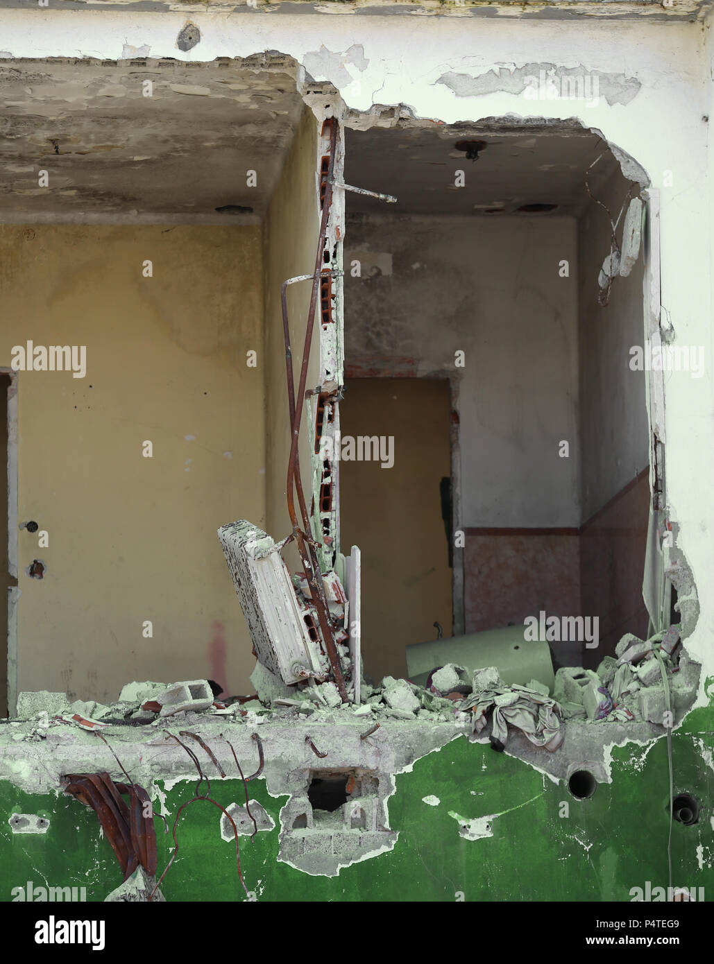 completely destroyed house with broken walls and without furniture ...