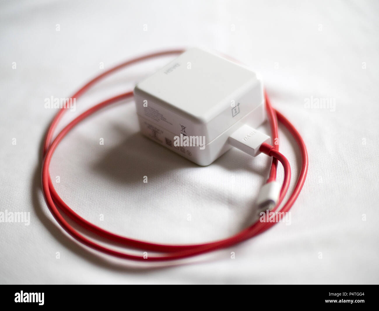 Different pictures of One Plus Dash Charger - white charger, red cagle ...