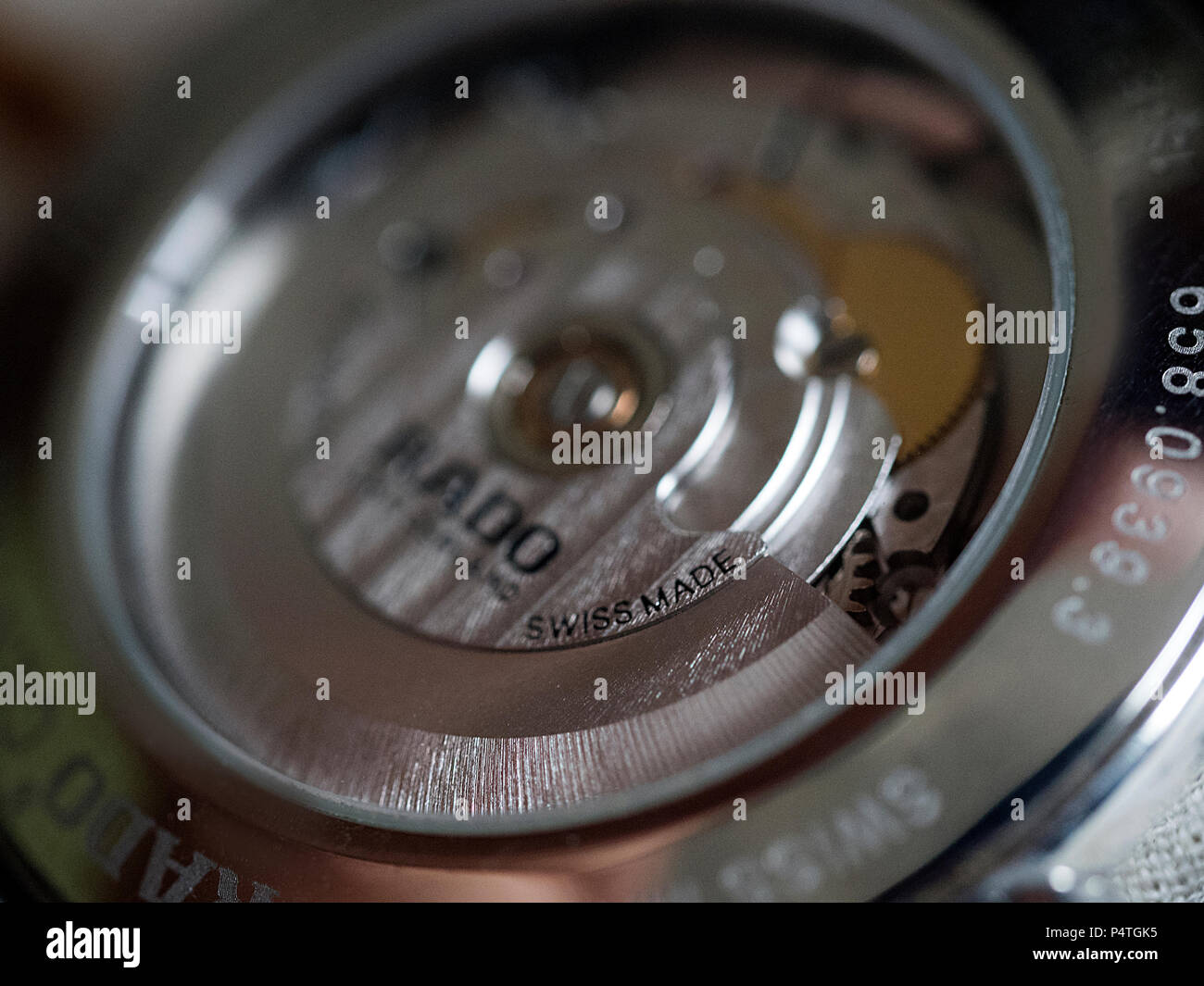 Closeups of a Rado automatic watch - Swiss made, of front dial and back ...