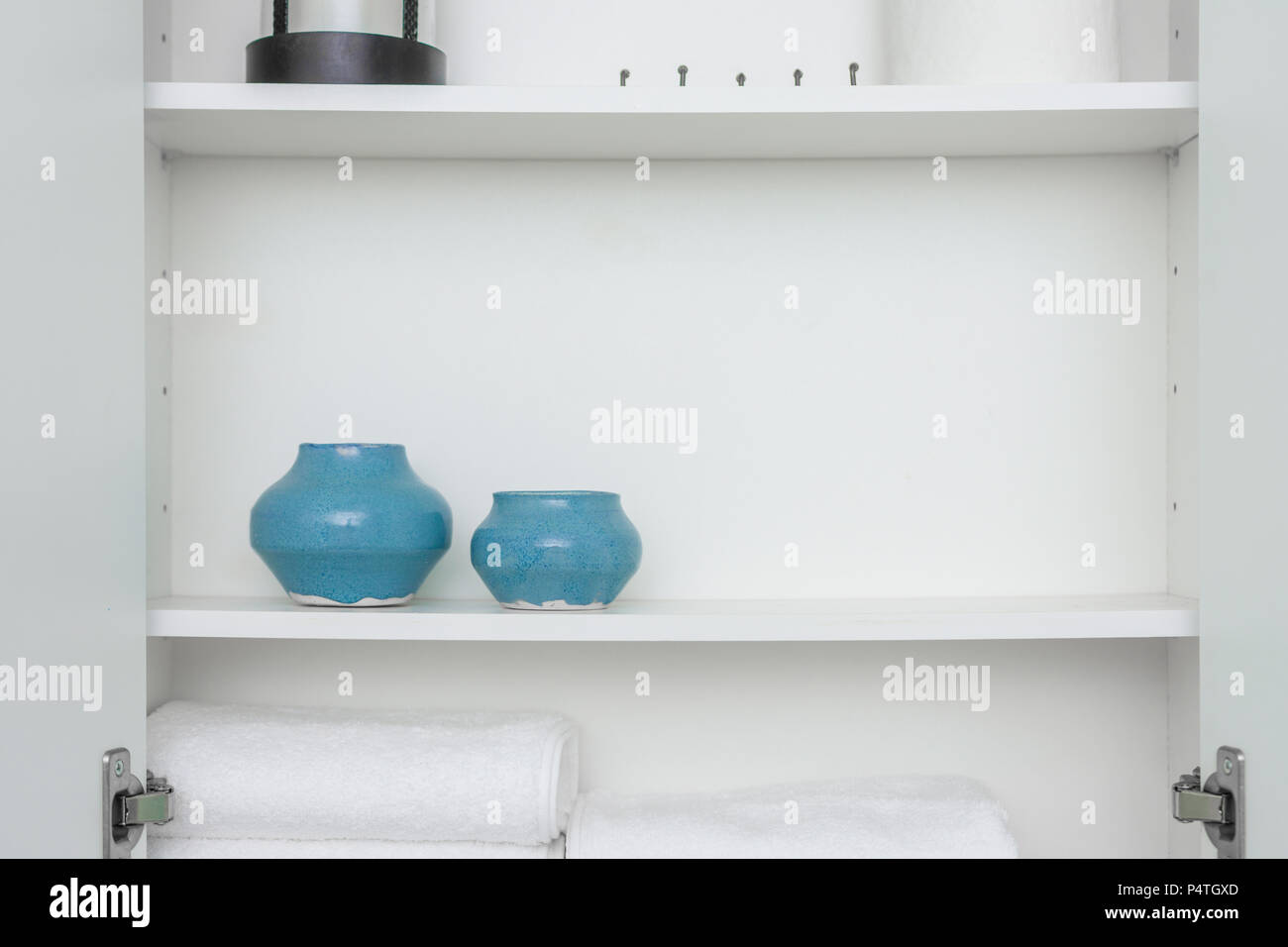 Clean white shelf in cabinet, empty space for product display Stock ...