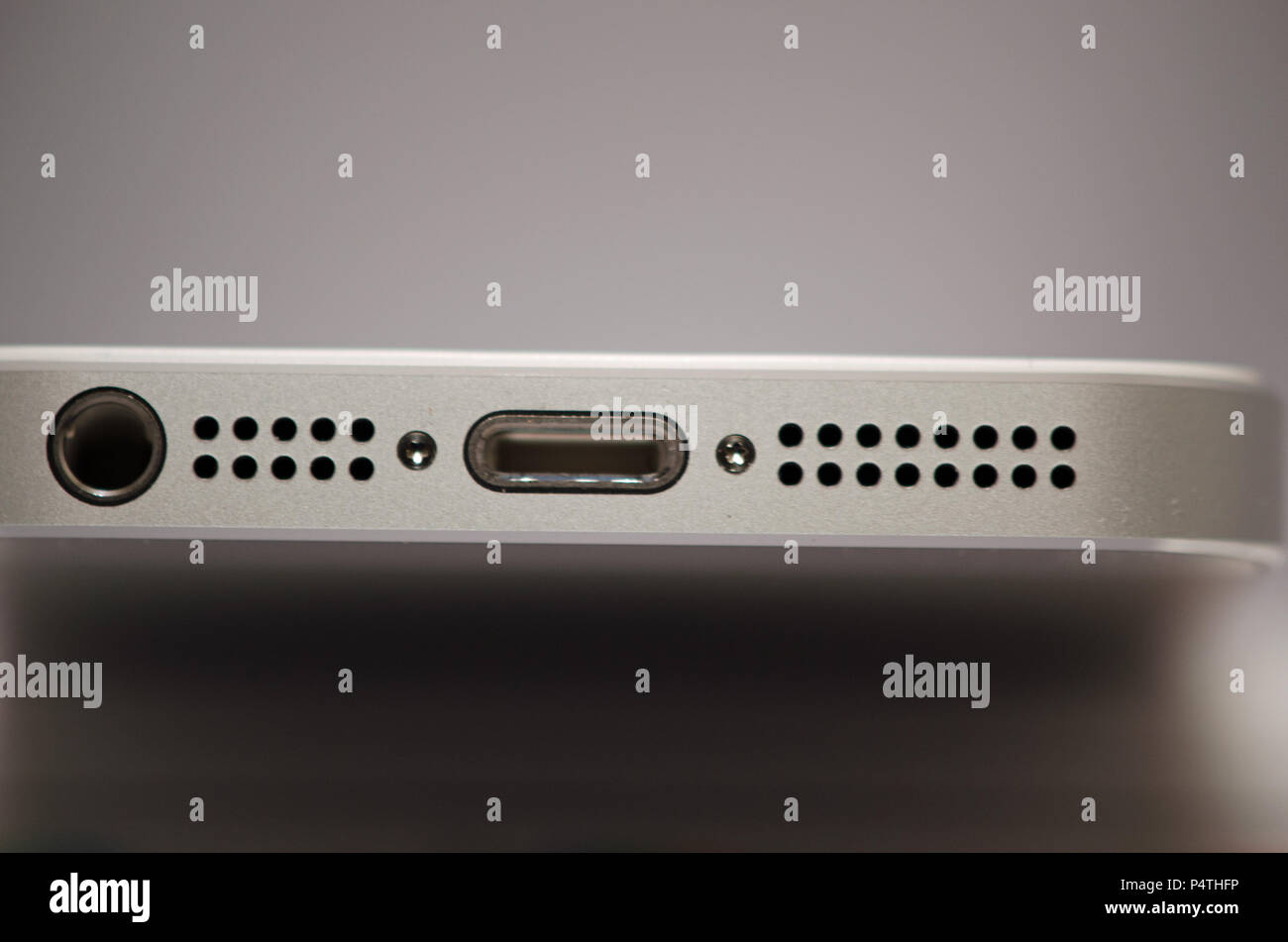 bottom part of phone showing connection ports Stock Photo - Alamy