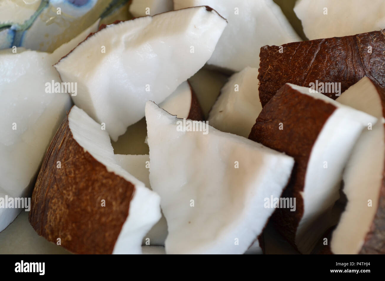 Pieces of coconut Stock Photo - Alamy