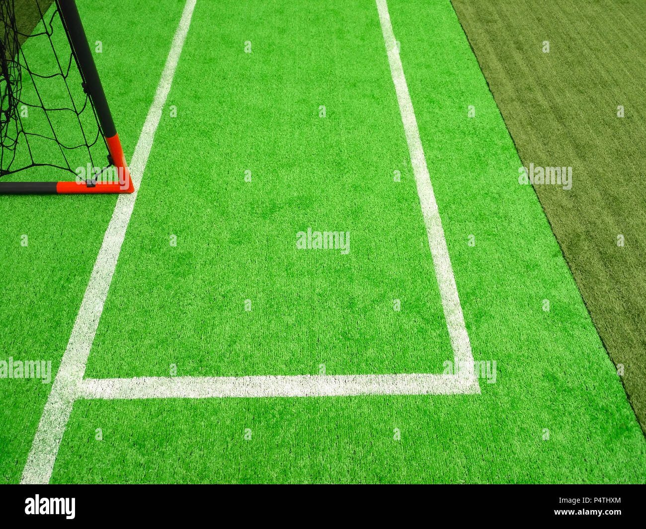 corner of the goal for an indoor soccer field Stock Photo - Alamy