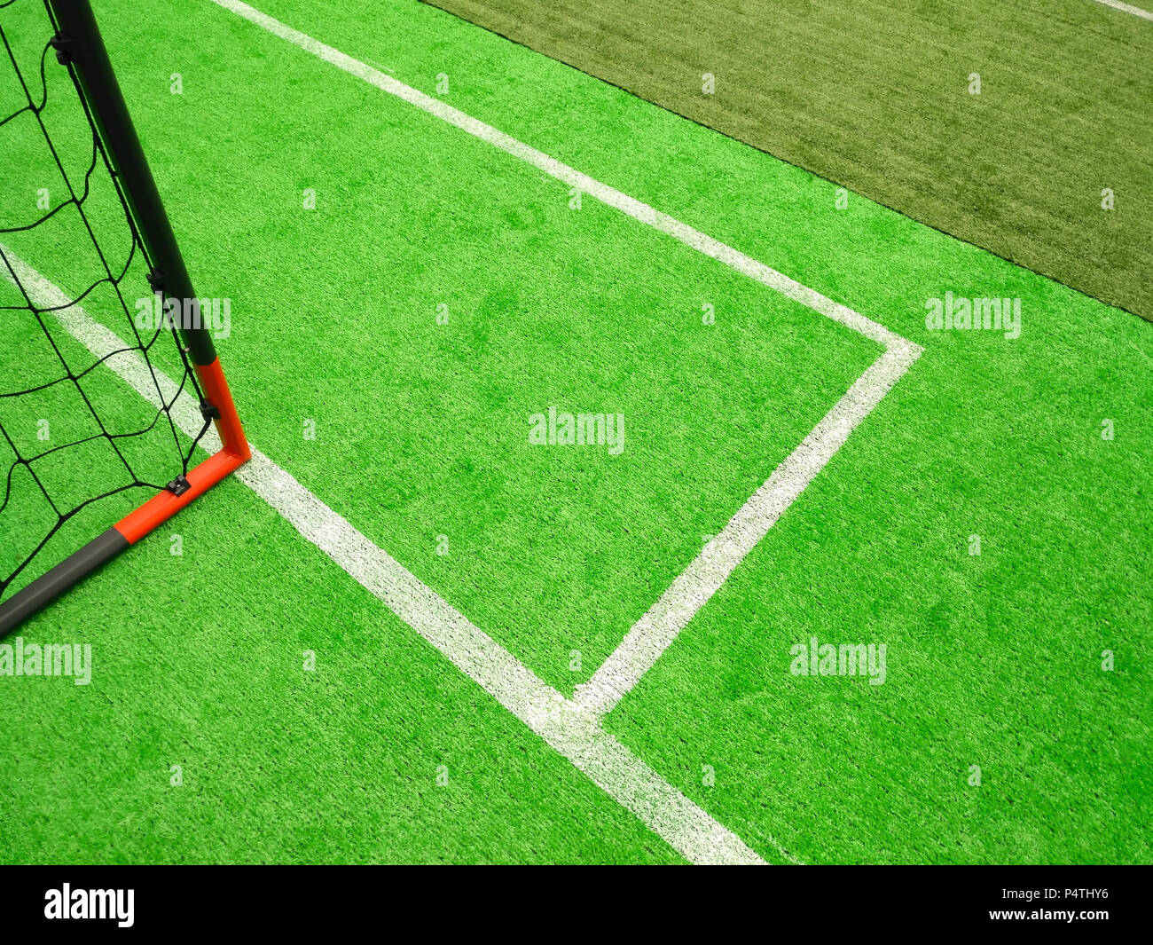 corner of the goal for an indoor soccer field Stock Photo - Alamy