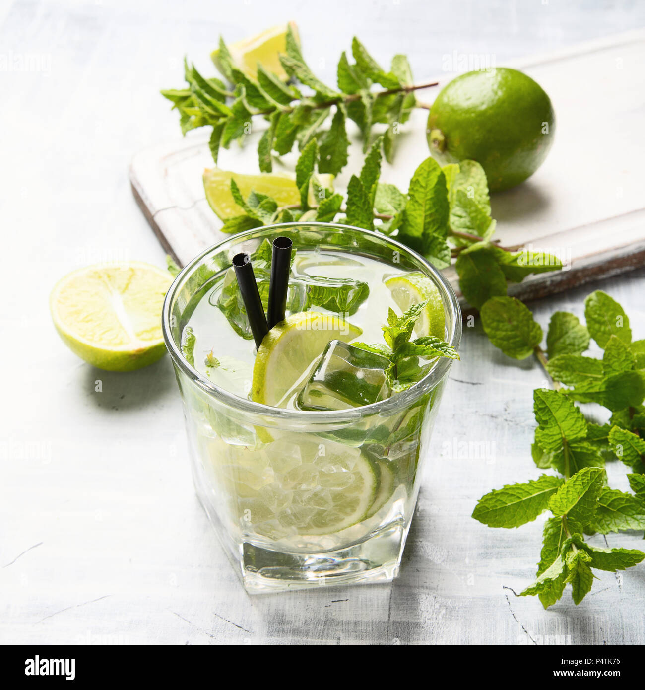 Mojito cocktail drink with lime and mint Stock Photo - Alamy