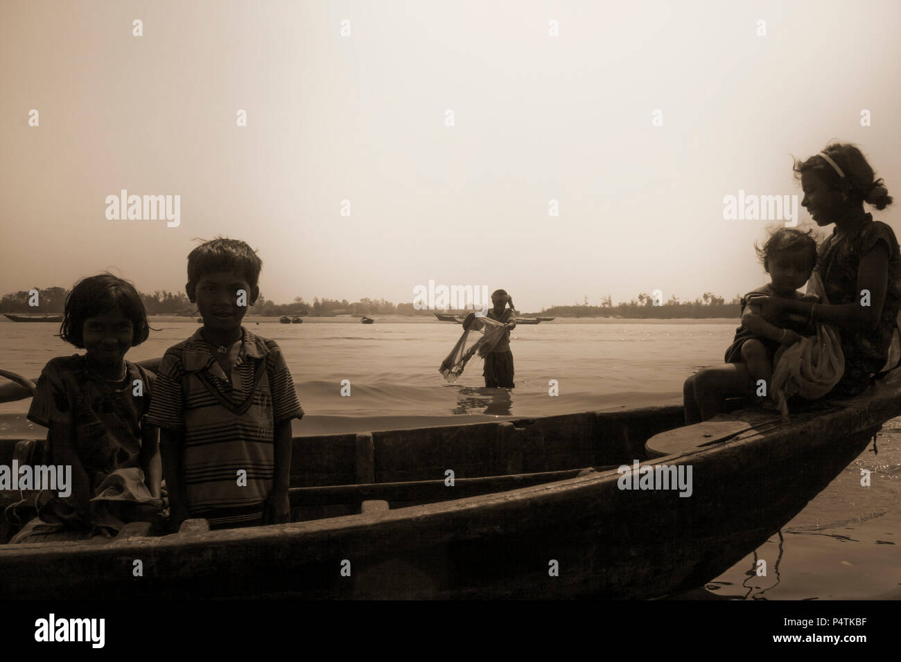 Indian Kids Sitting on Boat, Rural india Stock Photo - Alamy
