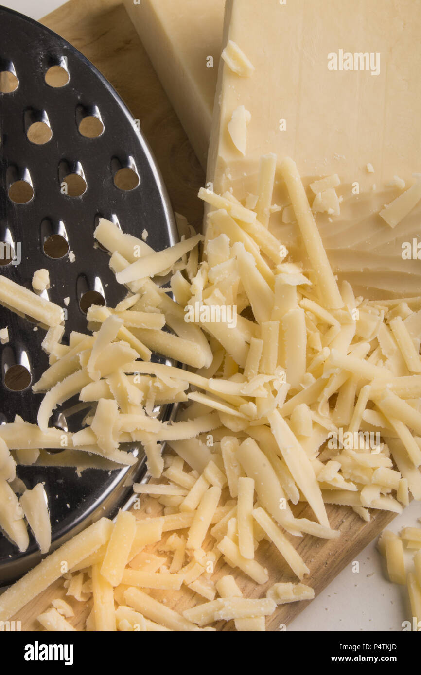 delicious grated irish organic mature cheddar cheese Stock Photo - Alamy