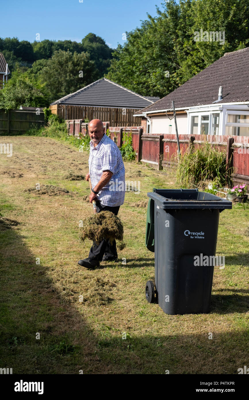 Old Man Raking Grass High Resolution Stock Photography and Images - Alamy