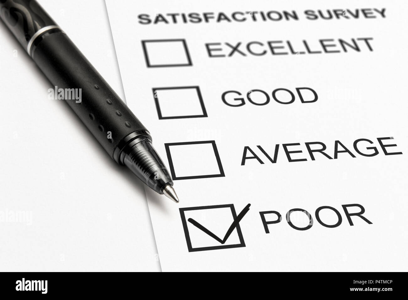 close up of a satisfaction survey with a check mark on poor Stock Photo ...