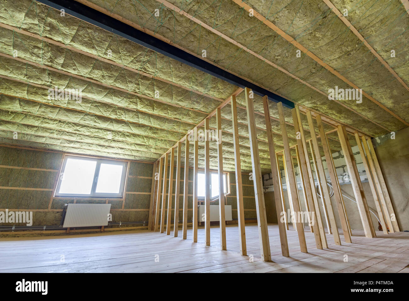 Construction and renovation of big light spacious empty room with oak ...