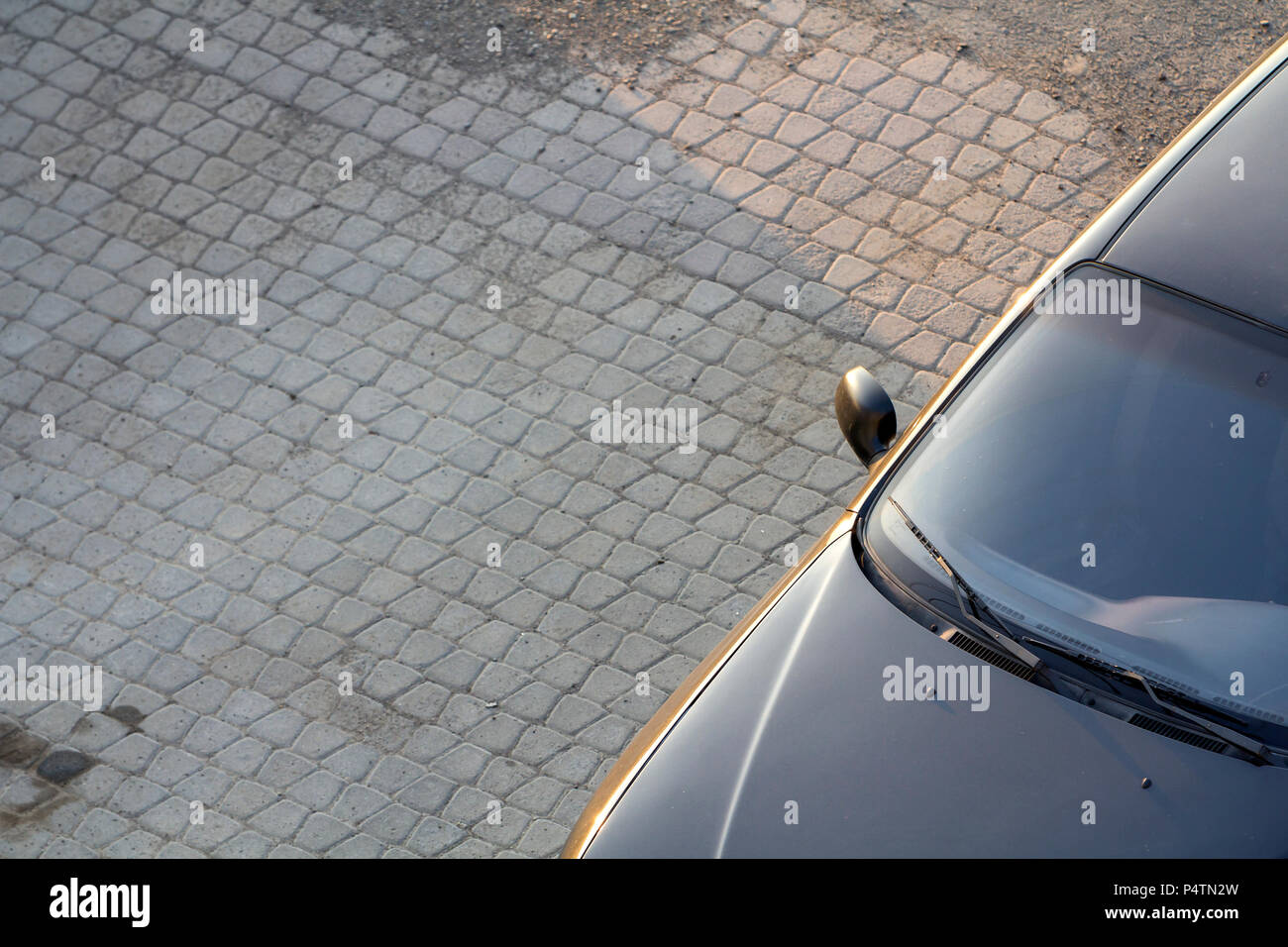 Close-up top view detail of new shiny black luxurious expensive car ...