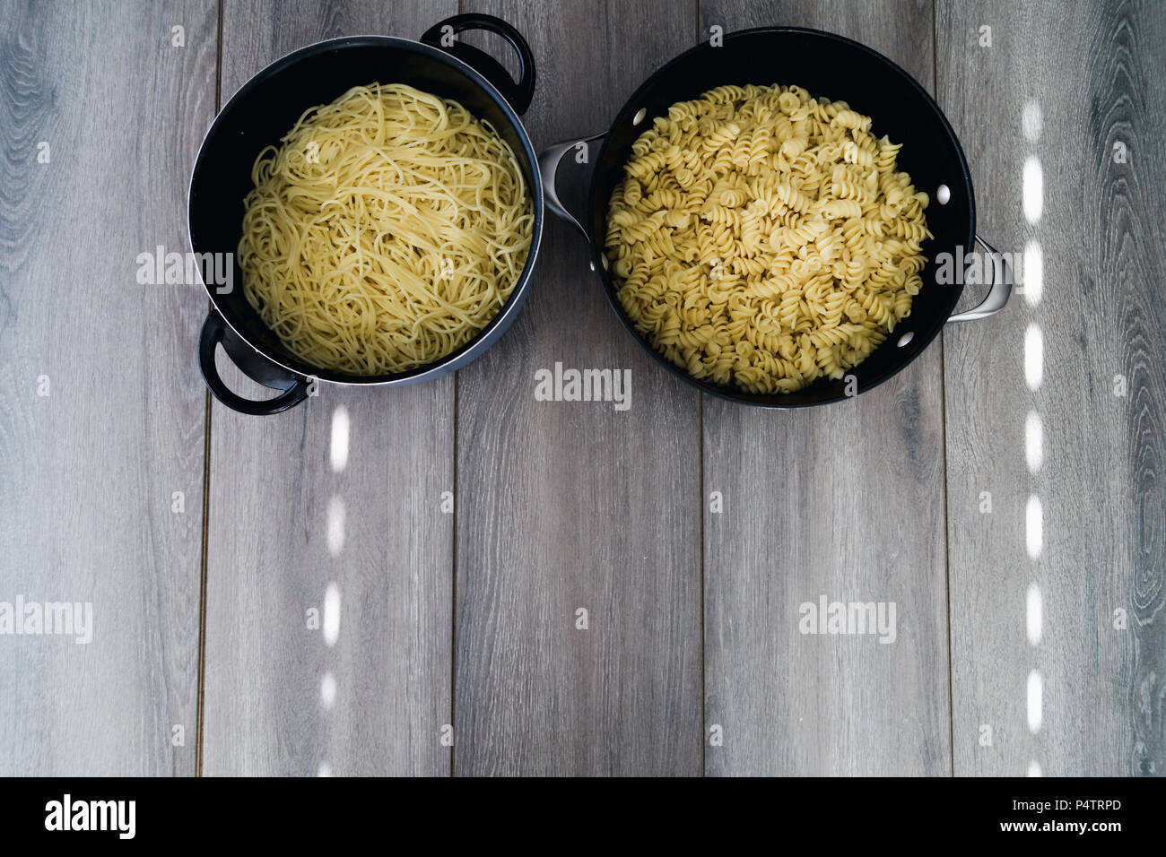 Bowl of Freshly cooked pasta on White wood Table Stock Photo - Alamy