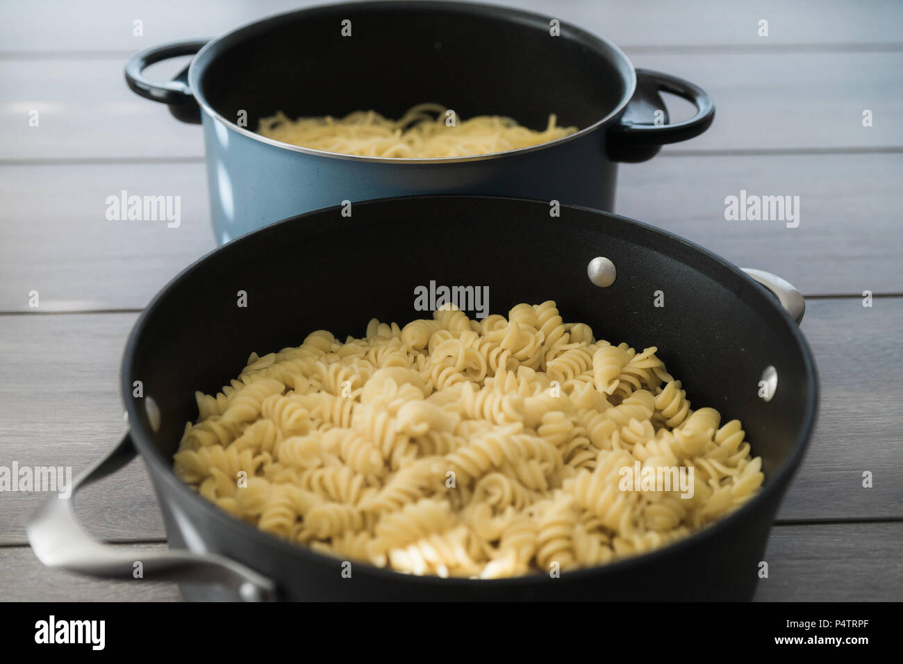 Bowl of Freshly cooked pasta on White wood Table Stock Photo - Alamy