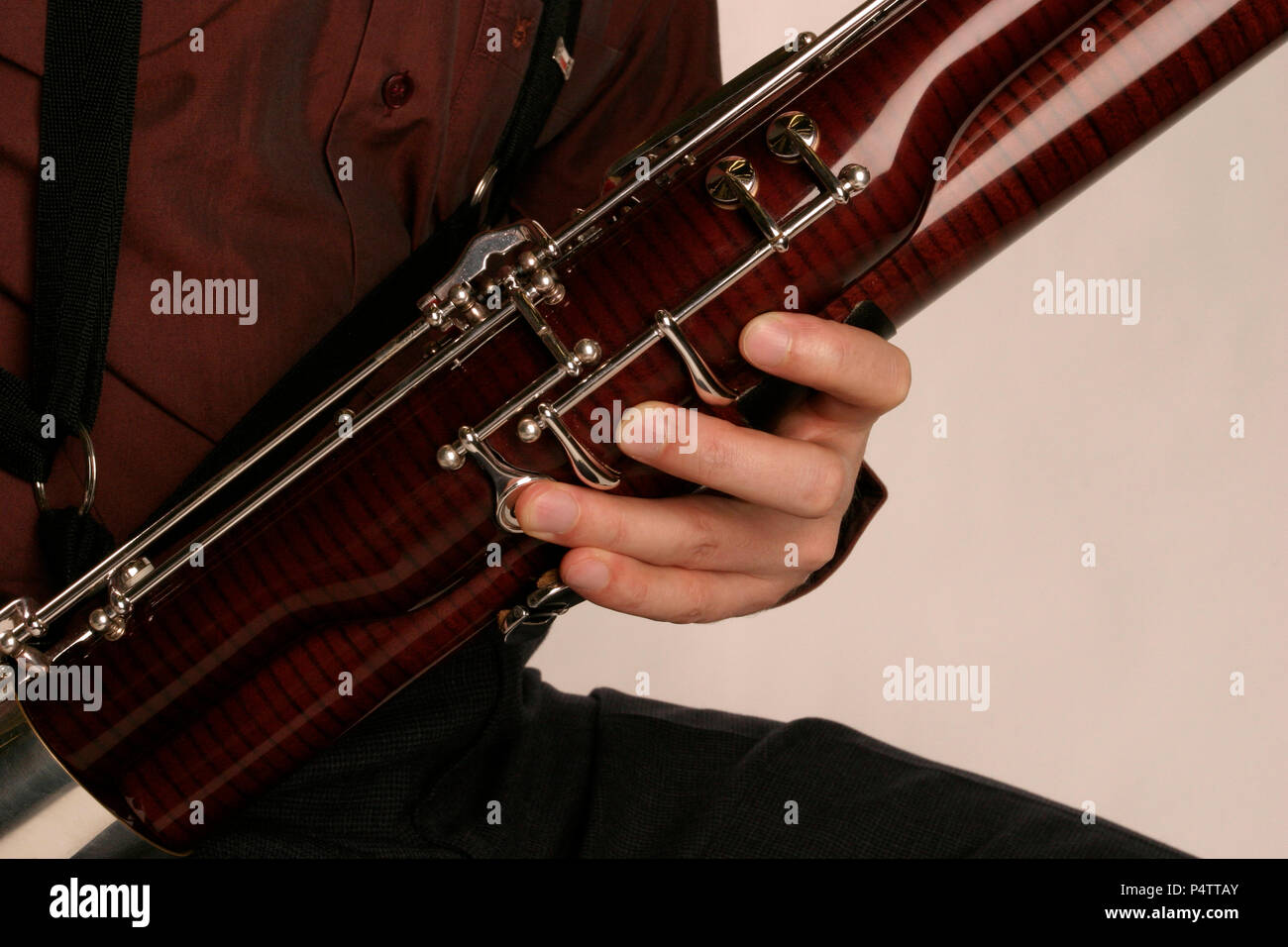 Bassoon showing position of the left hand on the instrument. Instrument ...