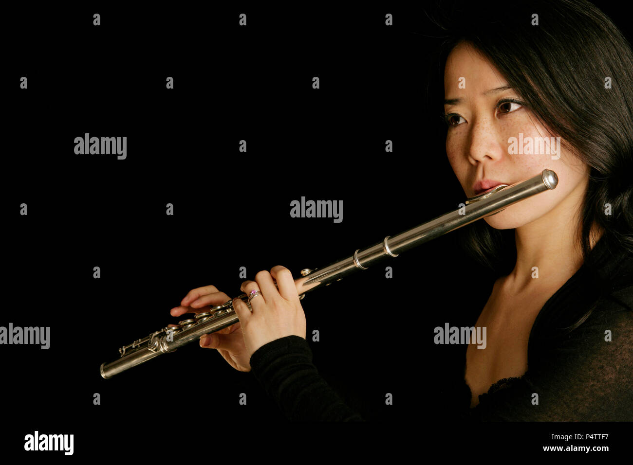Oriental woman flute hi-res stock photography and images - Alamy