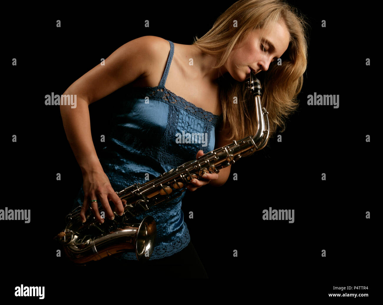 alto saxophone player Stock Photo - Alamy