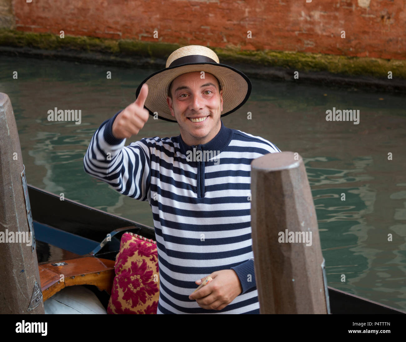 Smiling young venice gondolier hi-res stock photography and images - Alamy