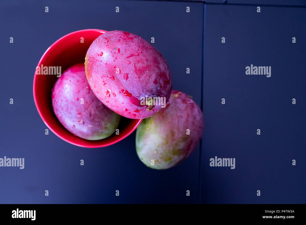 Fresh red mangoes in hi-res stock photography and images - Alamy
