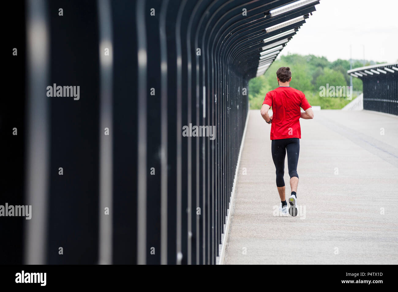 Man running back view one hi-res stock photography and images - Alamy