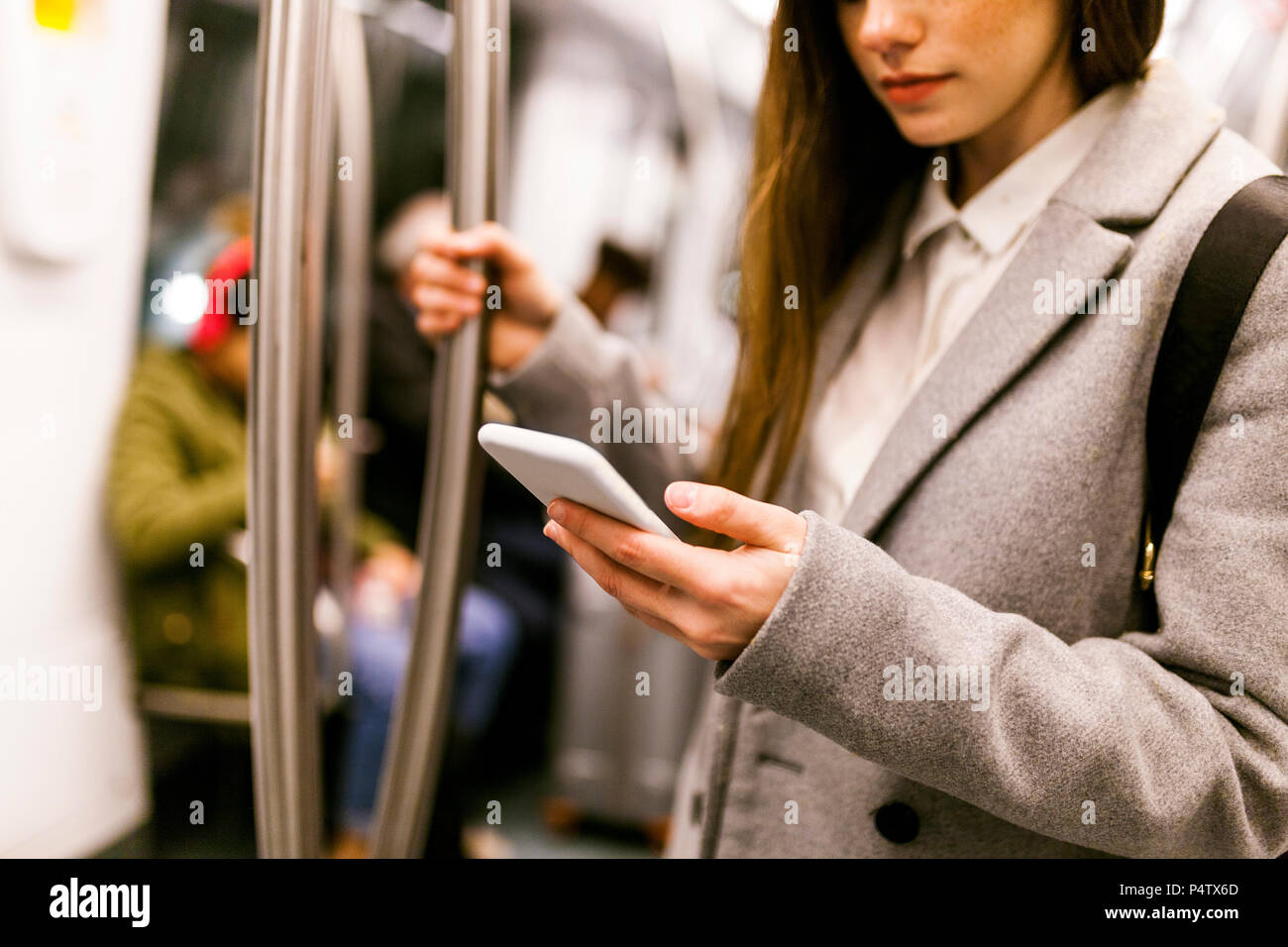 Businesswoman phone train hi-res stock photography and images - Alamy