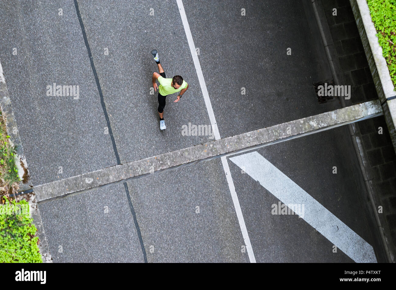 Top view of man running on a street Stock Photo - Alamy