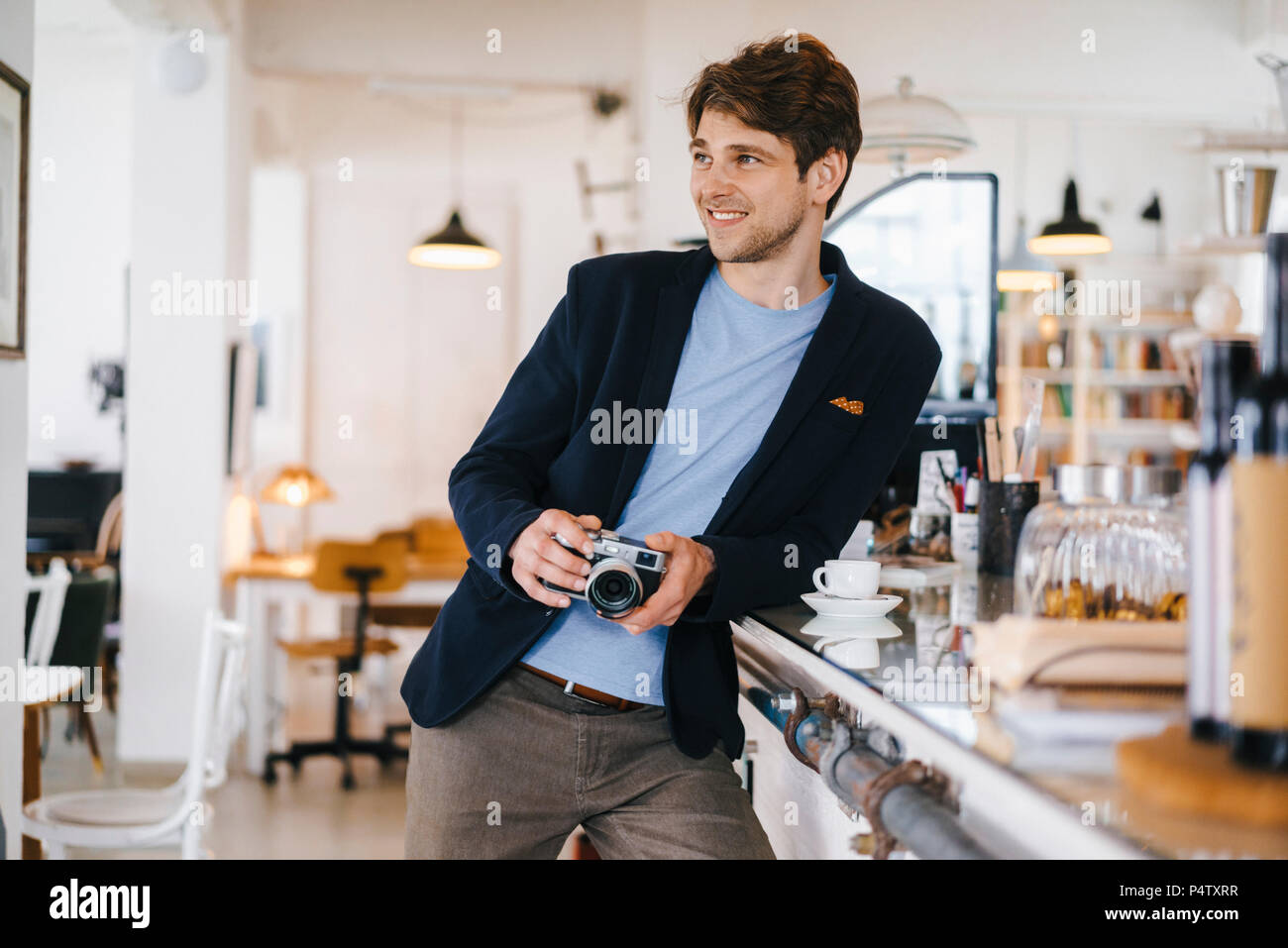 Holding up cameras hi-res stock photography and images - Alamy