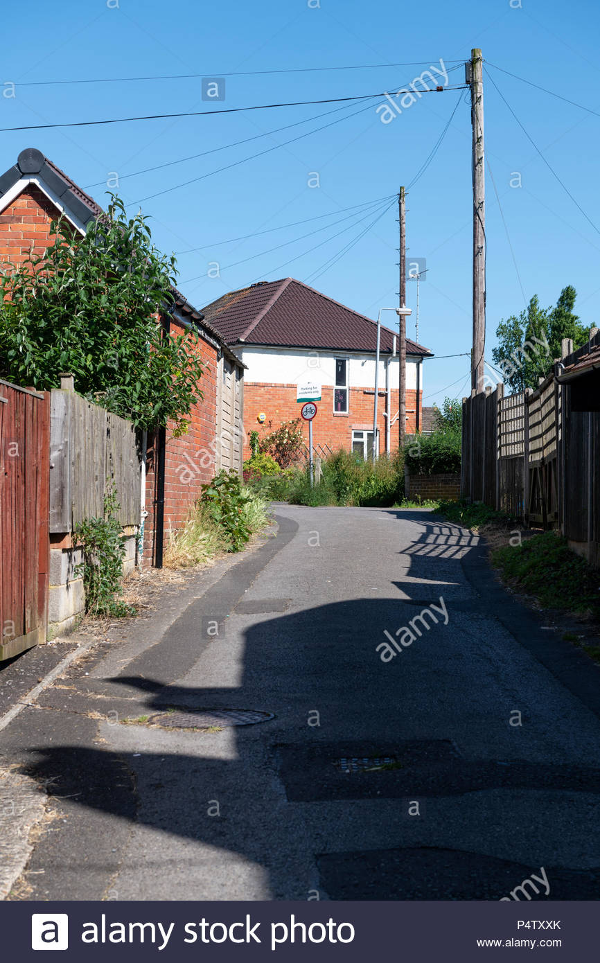 Alley Behind Fence High Resolution Stock Photography and Images - Alamy