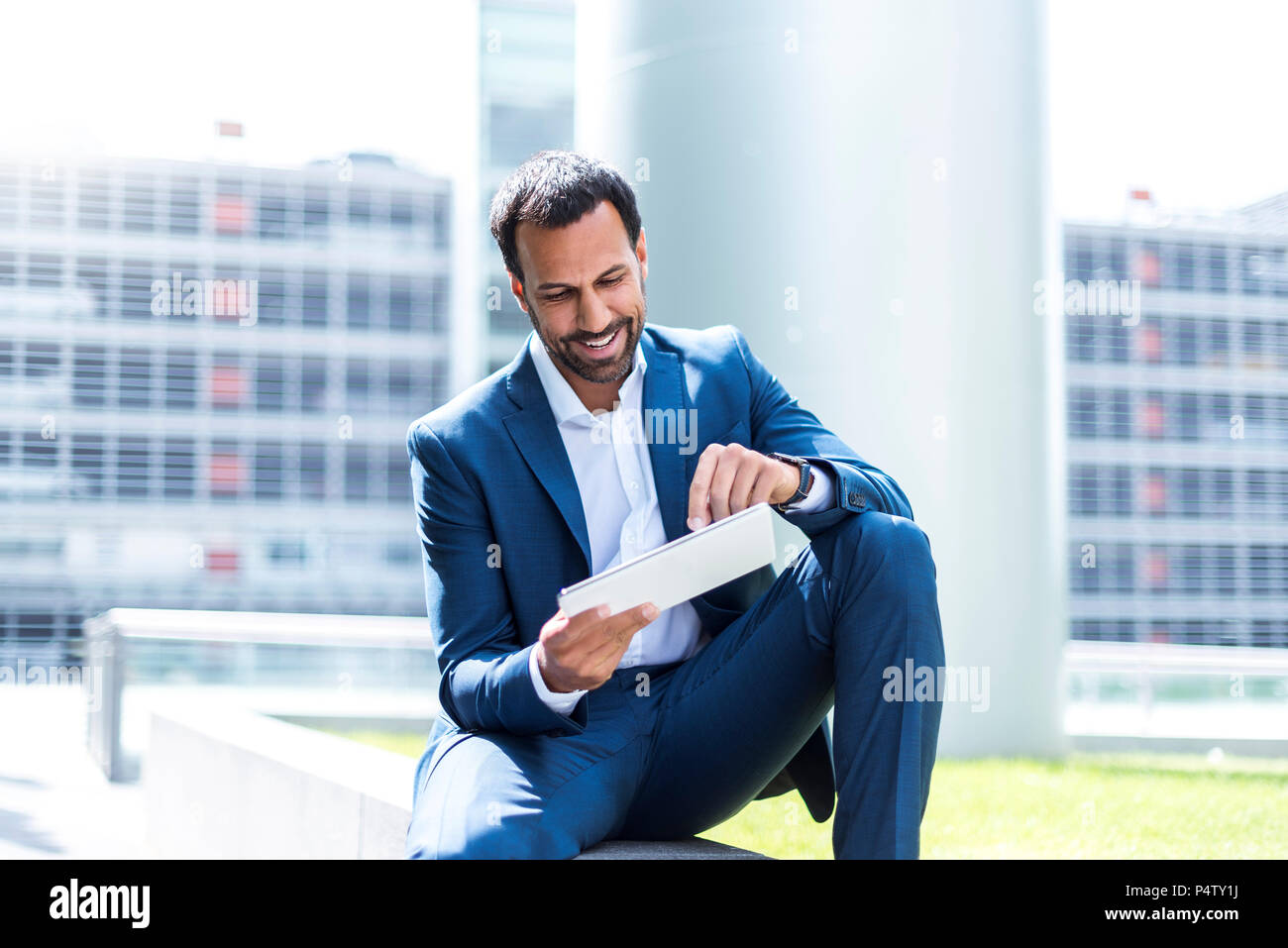 Business man using tablet Stock Photo - Alamy