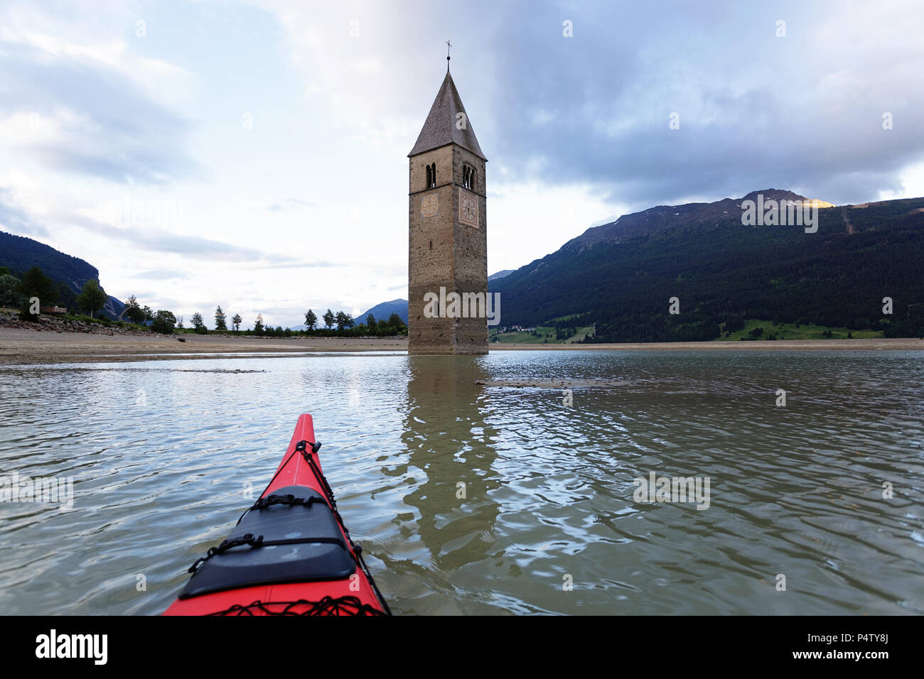 Church under water, drowned village, mountain landscape and peaks in ...