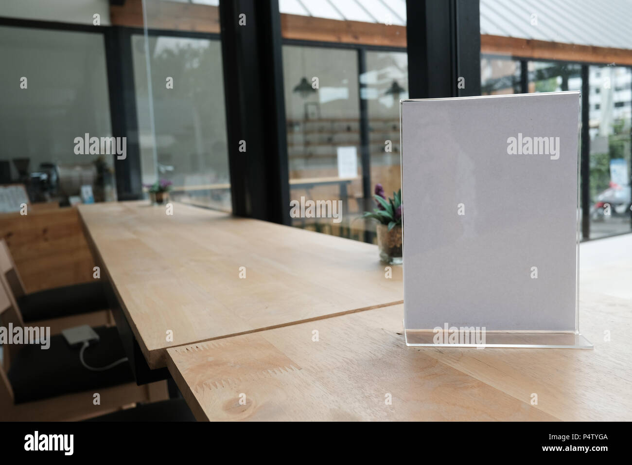 white label in cafe. display stand for acrylic tent card in coffee shop ...