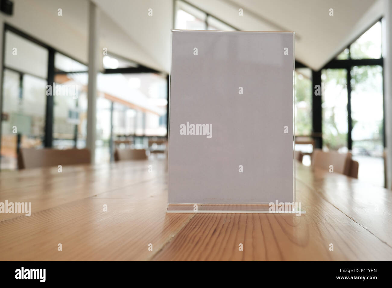 white label in cafe. display stand for acrylic tent card in coffee shop ...