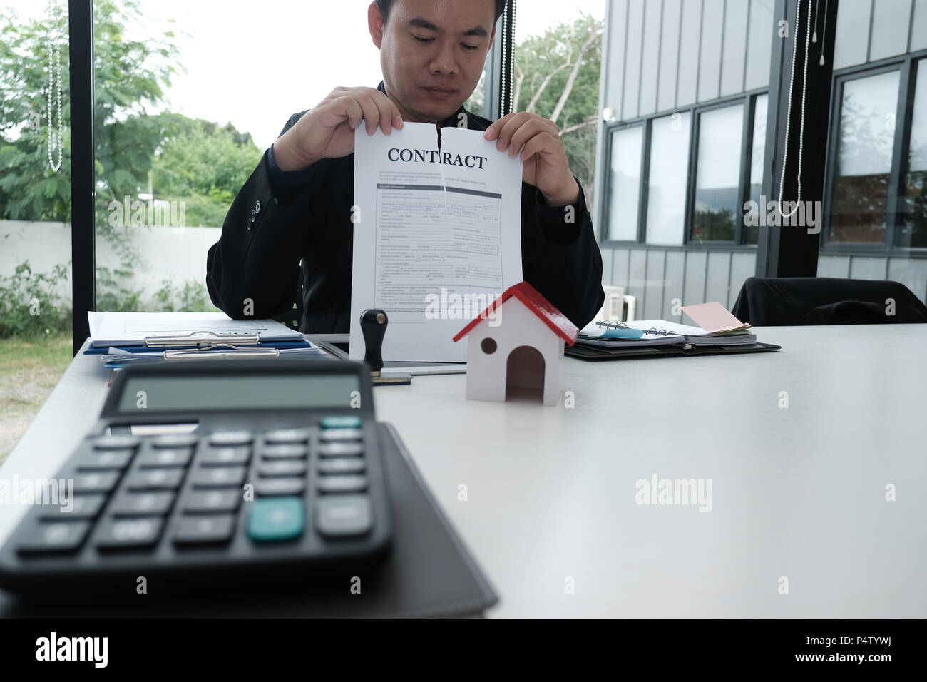 businessman tearing agreement document. breaking contract at office ...