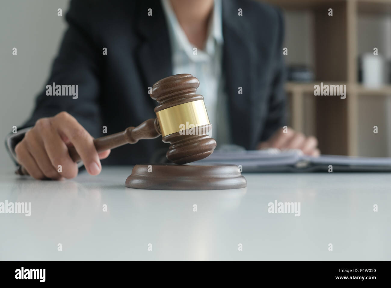 judge holding legal law gavel. lawyer attorney justice workplace Stock ...