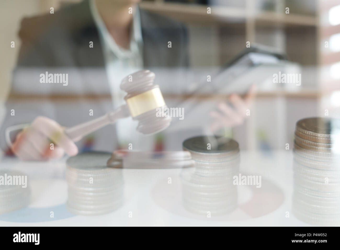 judge holding legal law gavel double exposure with coin money. lawyer ...