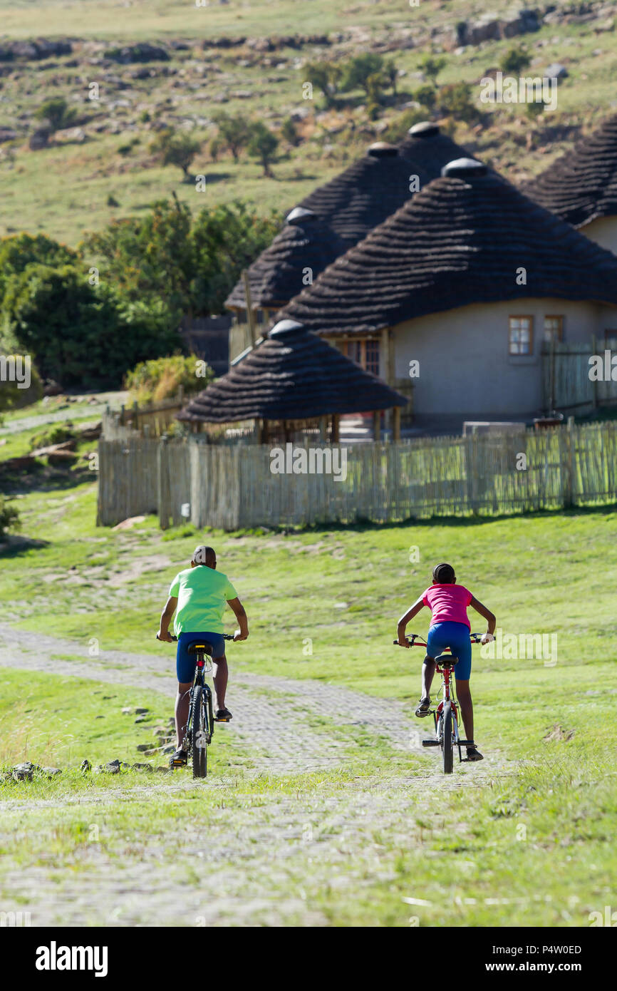 African Children riding bikes in a rural village in South Africa Stock ...