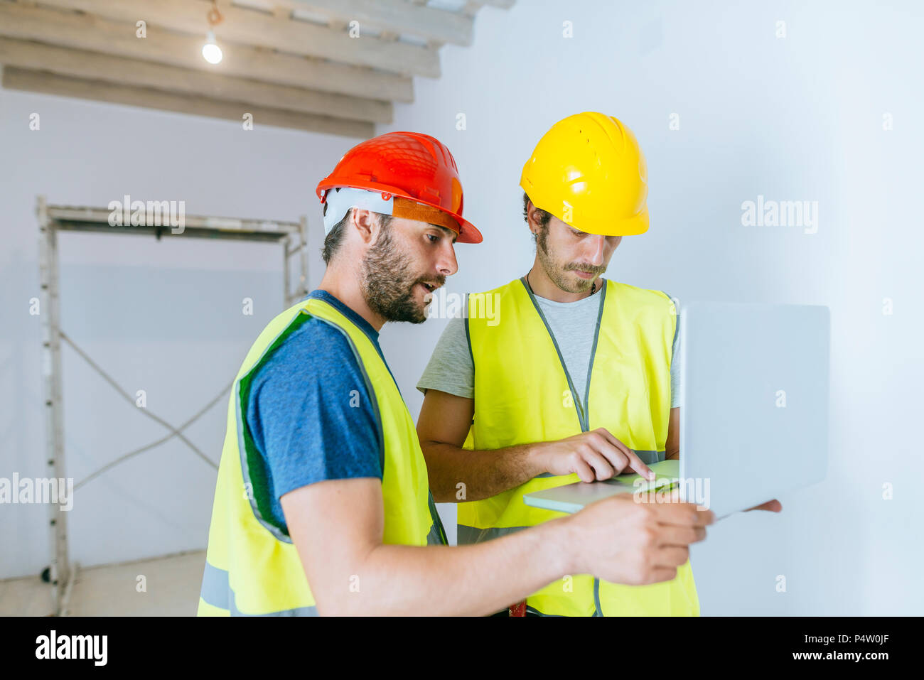 Construction Workers Working Inside