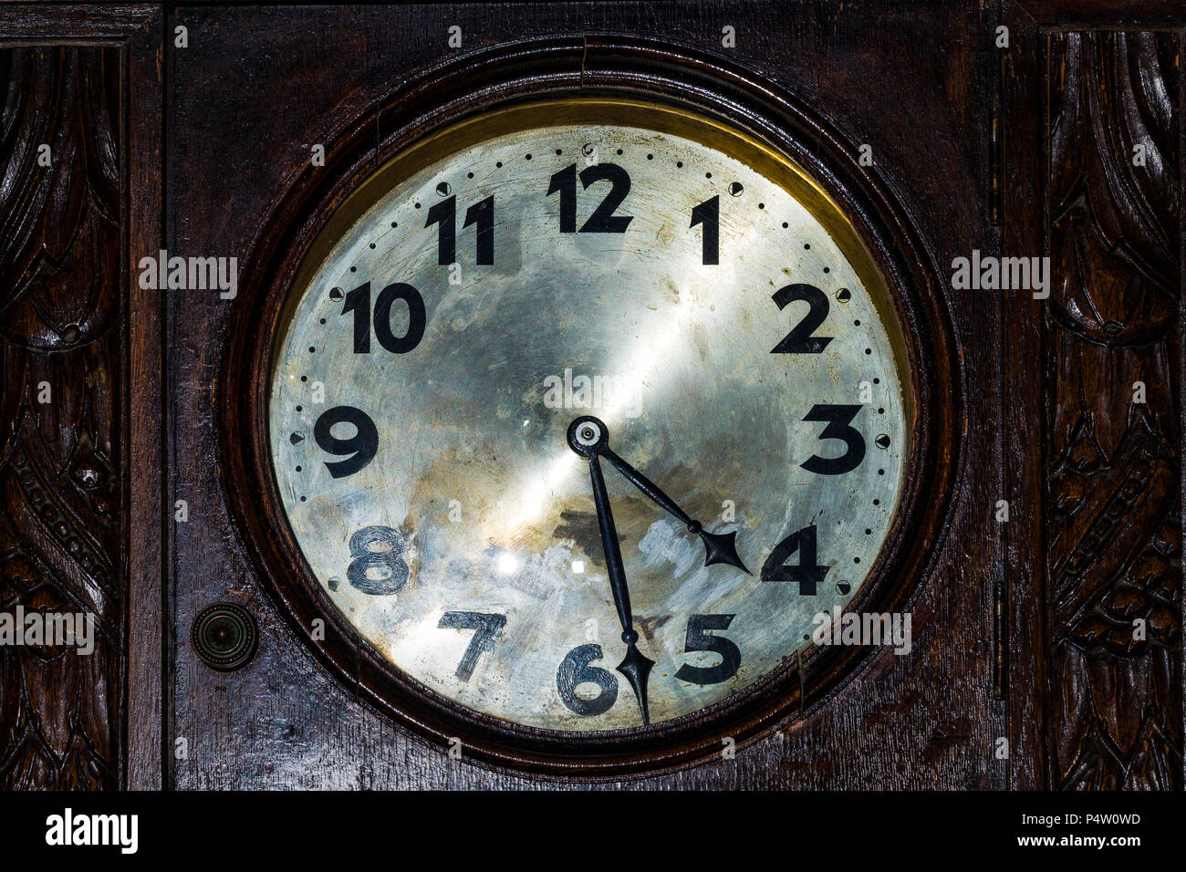 old antique wooden wall clock, background image Stock Photo - Alamy