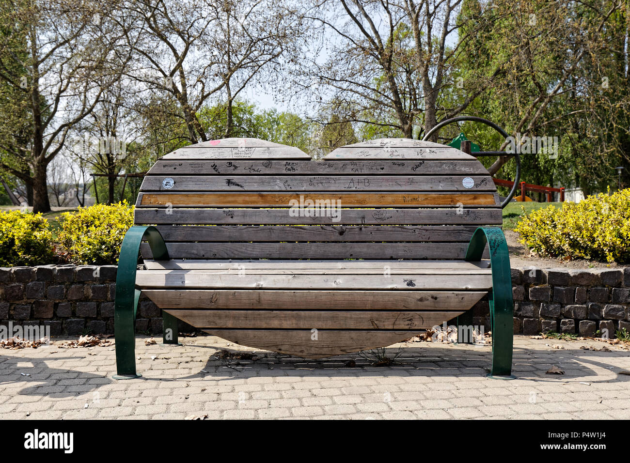 A hearth-shaped bench in Margaret Island, Budapest, Hungary Stock Photo ...