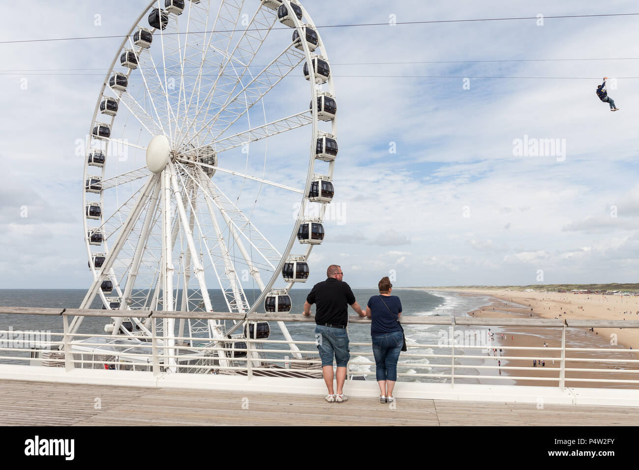 Scheveningen, Netherlands, ferris wheel and cable car at the beach ...