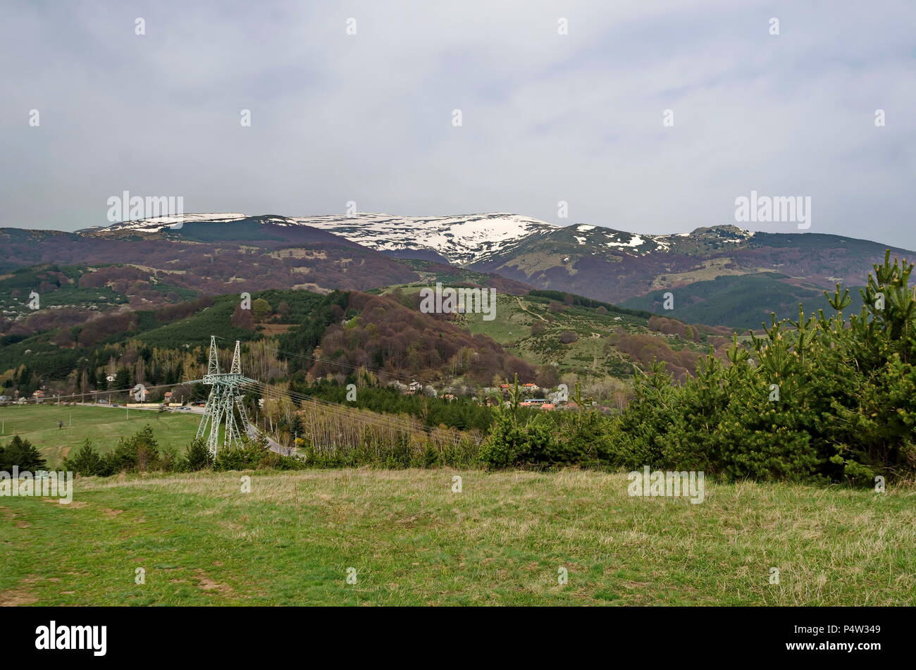 Scene with snowy top, springtime foot of the mountain, glade, mix ...